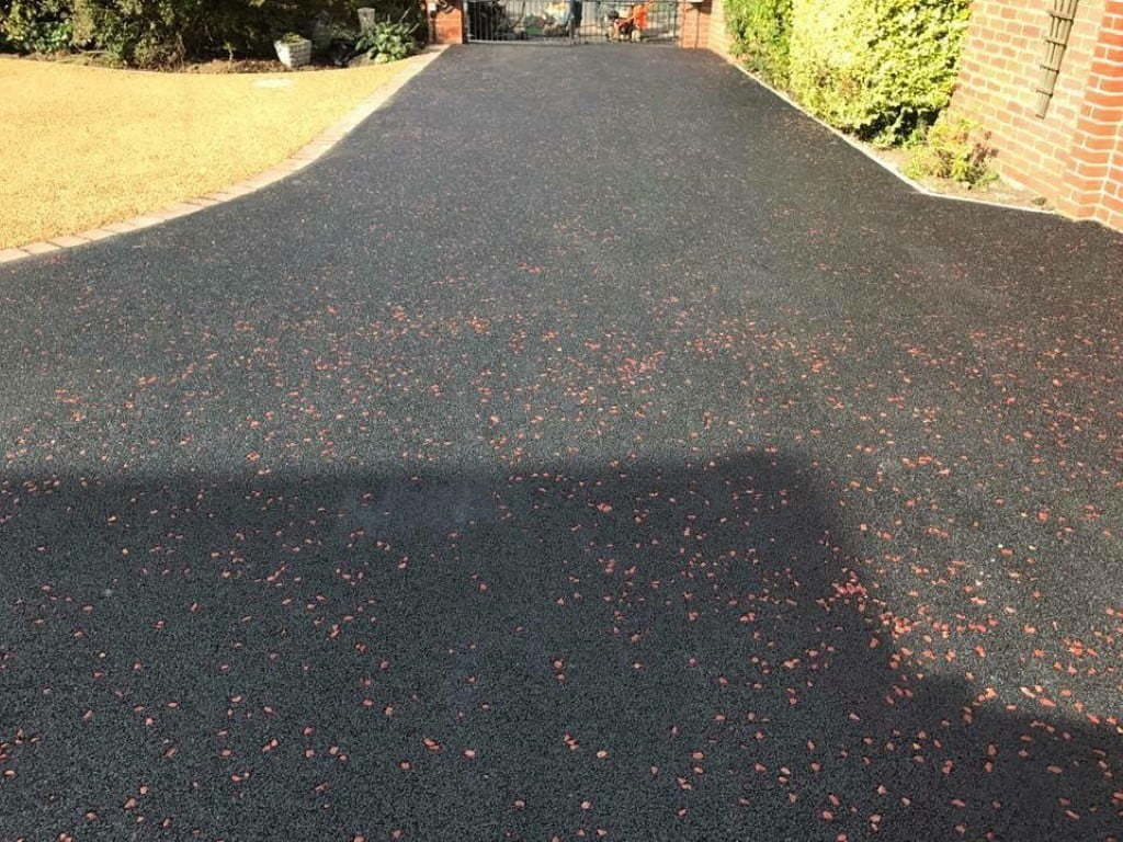 Tar and Chip Driveway Builders Stock → Co-Operative Contractors LTD